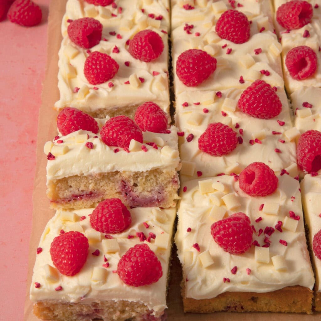 Raspberry & White Chocolate Traybake Cake - The Baking Explorer